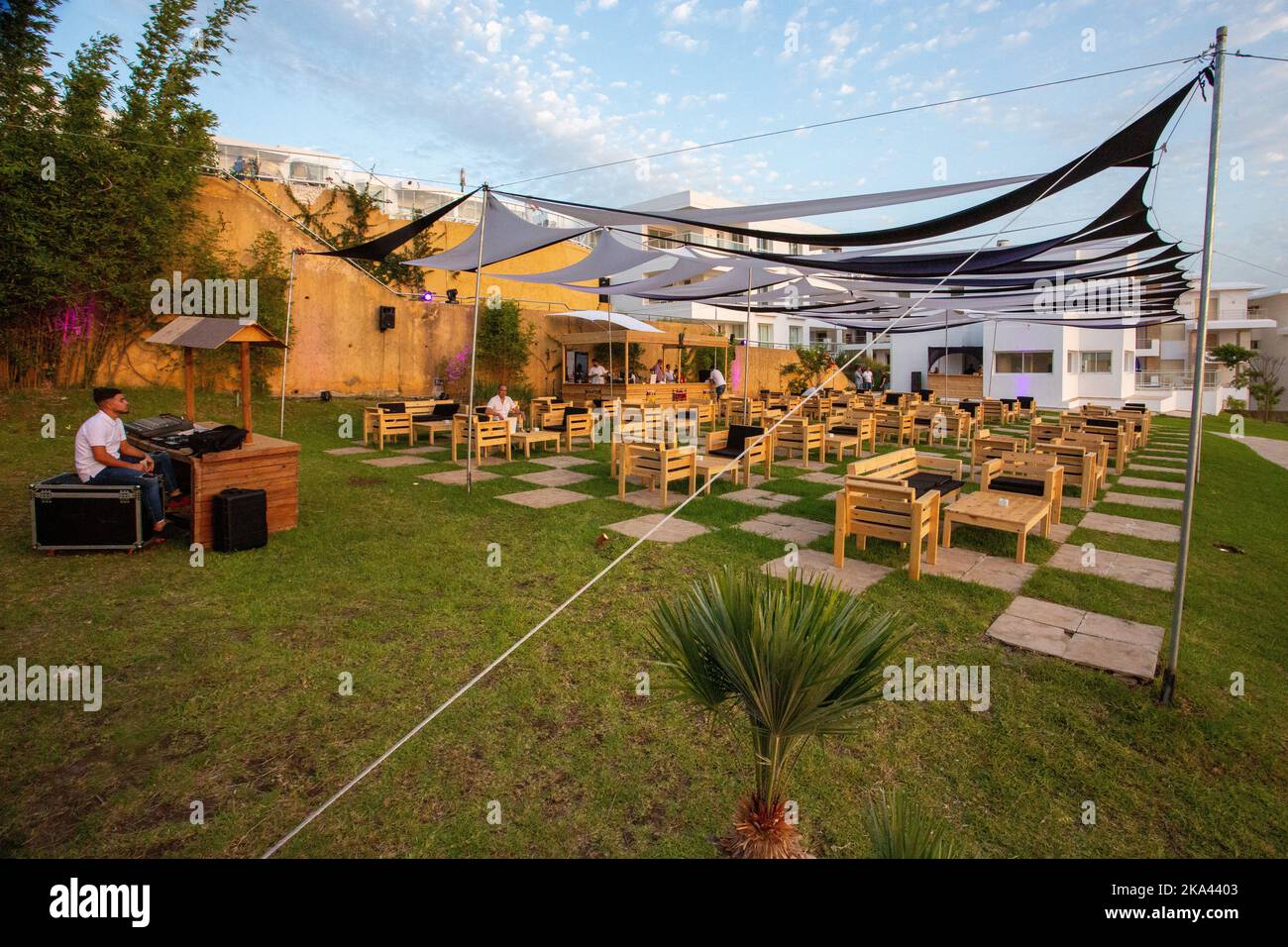 hotel patio terrace with wooden furniture Stock Photo - Alamy