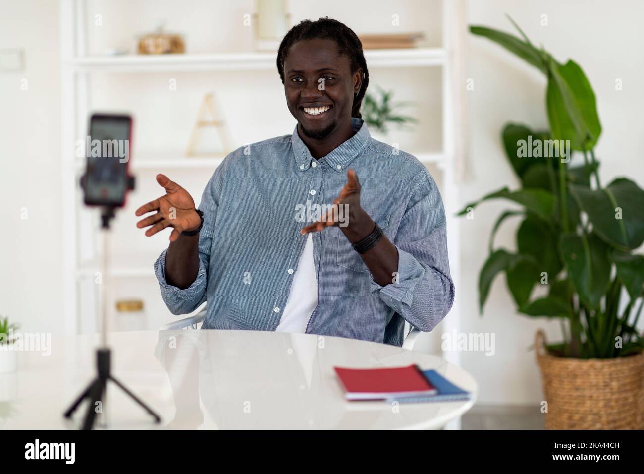Young Smiling African American Man Recording Video Vlog With Smartphone ...