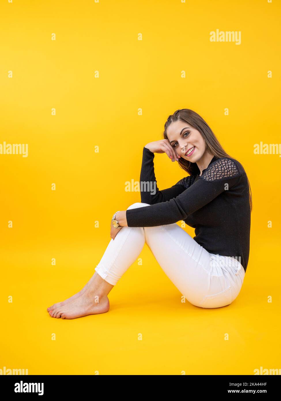 A beautiful caucasian female posing for a photo in a studio Stock Photo ...