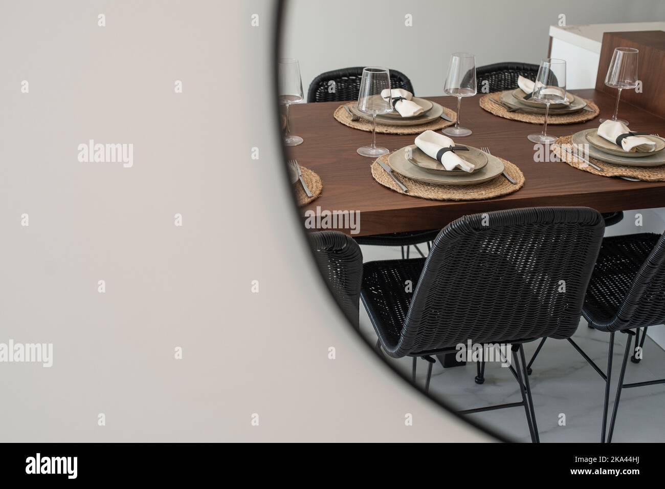 A reflection of a laid dining table seen in a mirror Stock Photo - Alamy