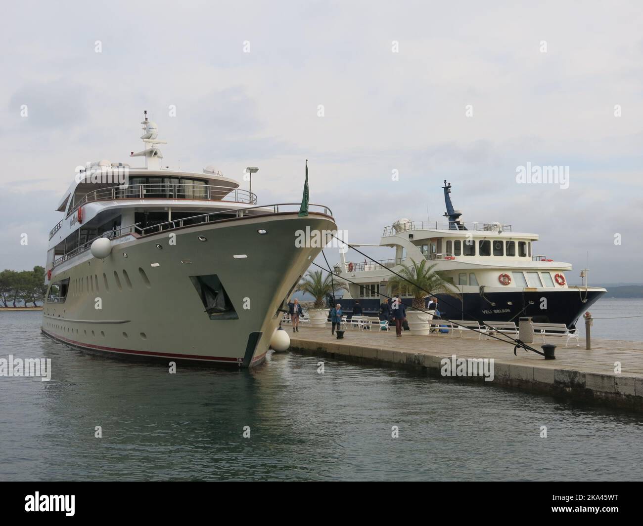 Cruise ship "Queen Eleganza" & local ferry, moored at the landing stage ...