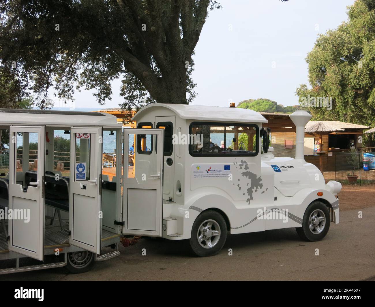 The land train takes tourists on a sightseeing tour of Veliki Brijuni ...