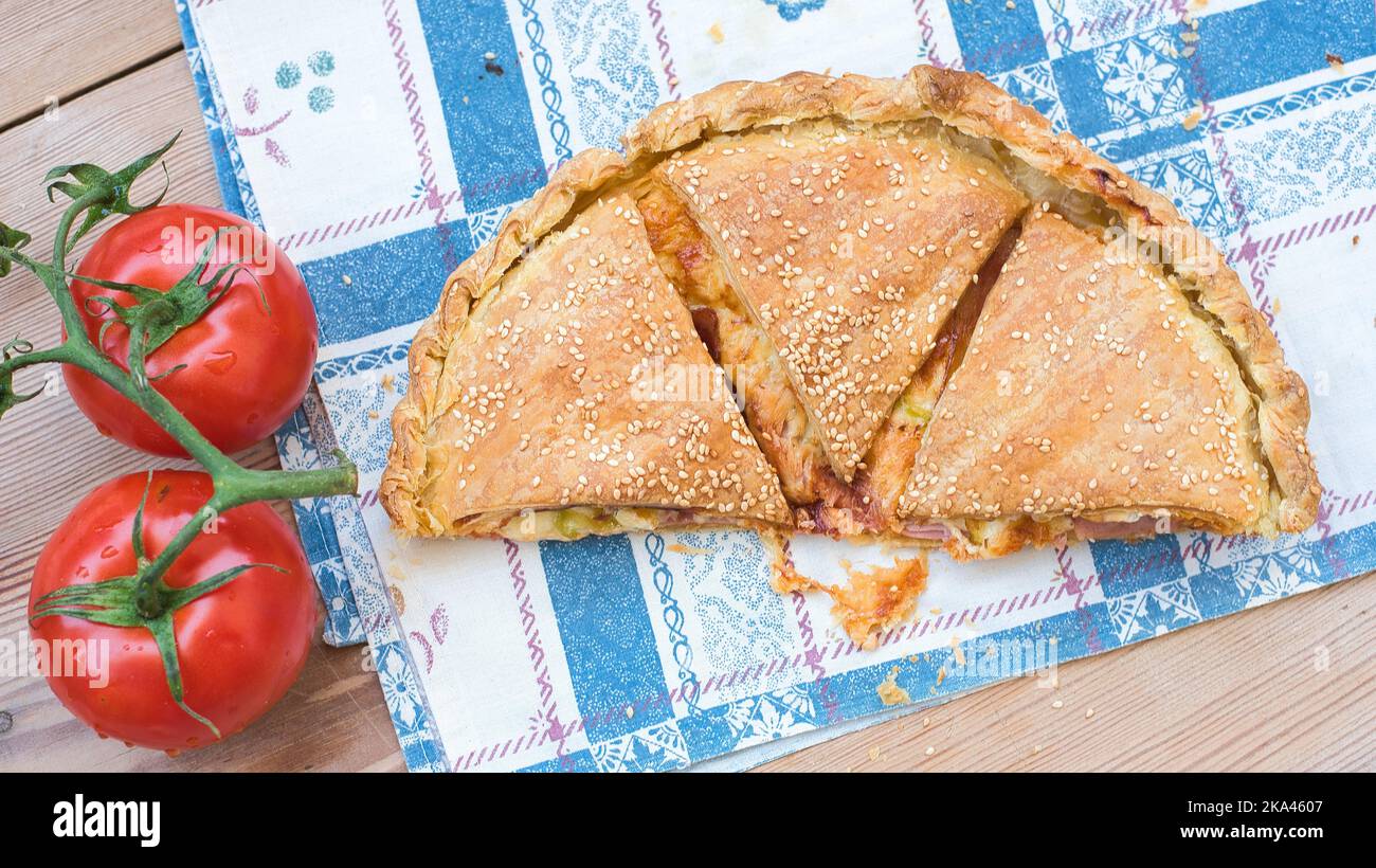 traditional pie, covered pizza baked in wood with wood Stock Photo - Alamy