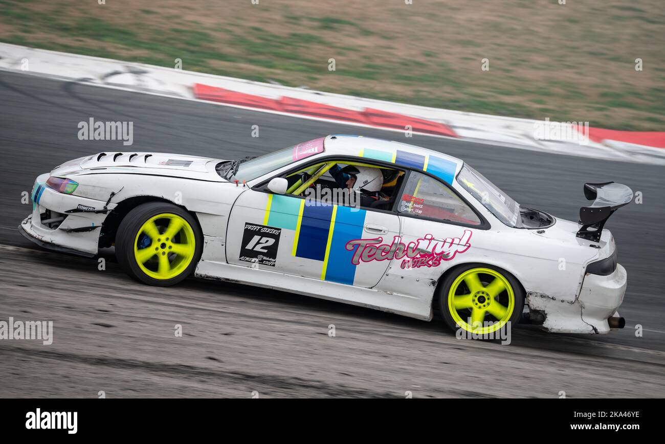 Nissan Silvia S14 in white drifting on the circuit Stock Photo - Alamy