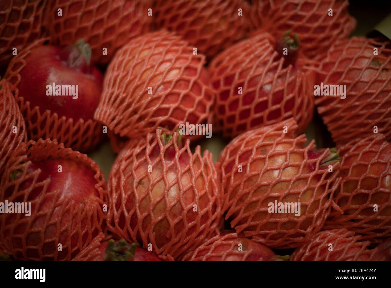 Fruits in net. Sale of natural fruits. Delicious healthy food ...