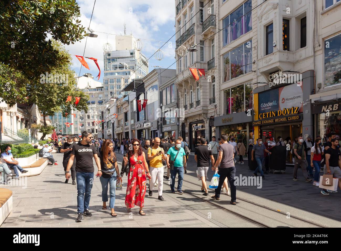 View of people walking on Istiklal Avenue the city’s main pedestrian ...