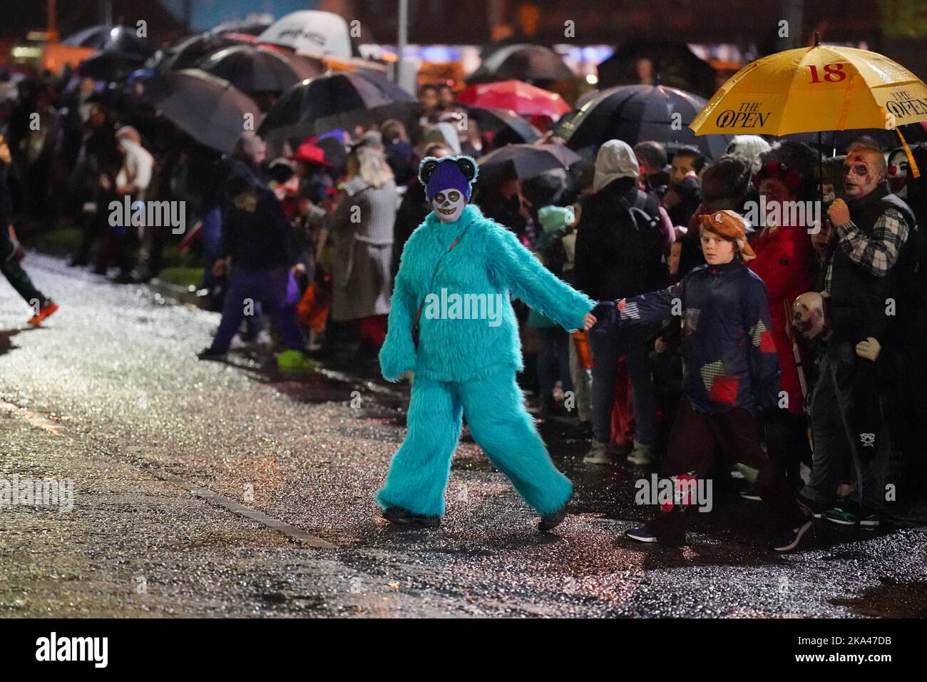 People during the Derry Halloween parade in Londonderry. Picture date ...