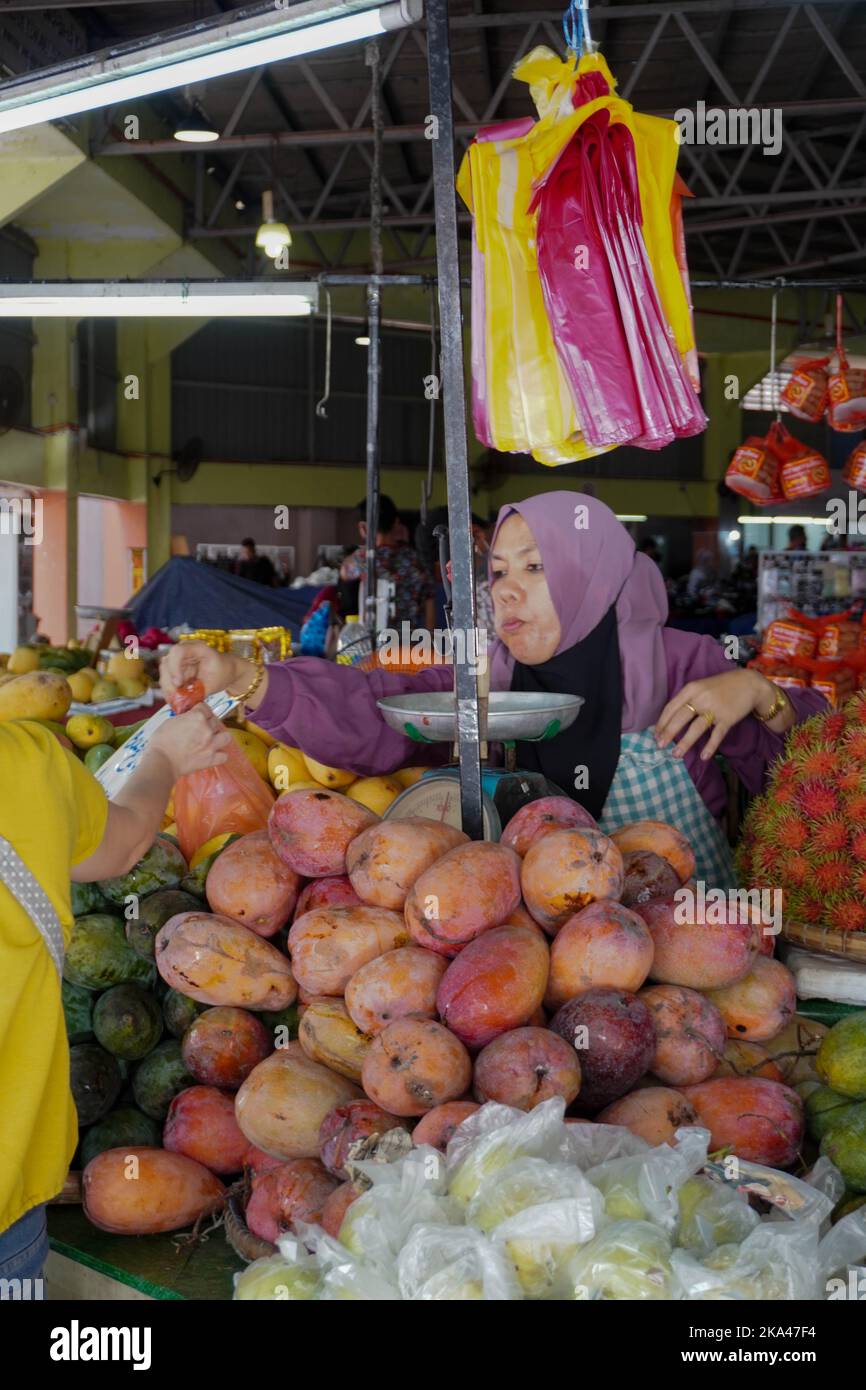 A view of the local bazaar (known as morning market) which is full of ...