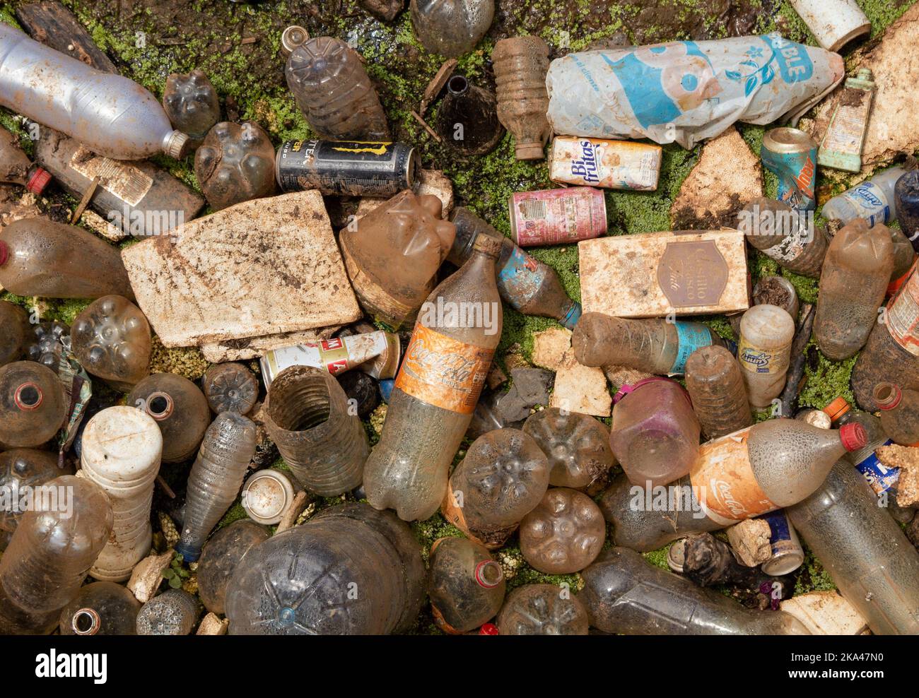 Plastic bottles and litter, rubbish in river Stock Photo - Alamy