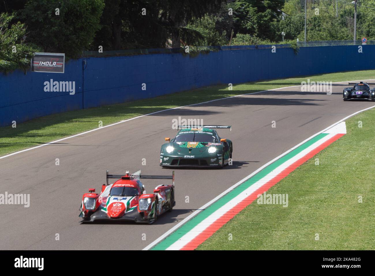 A beautiful racing cars on Imola track the 24h racing day under ...