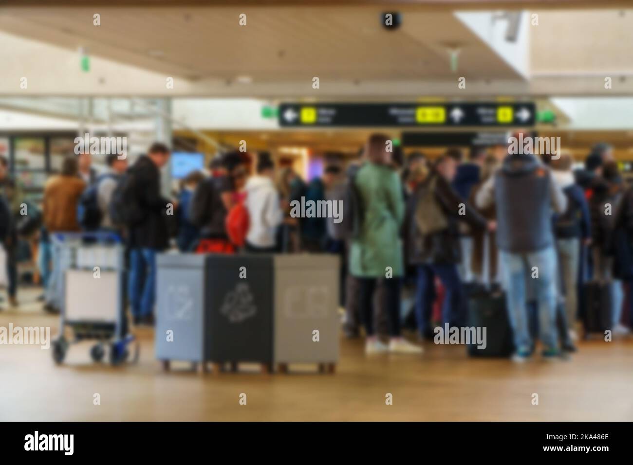 Crowd of people are waiting to board a plane at the airport Stock Photo ...