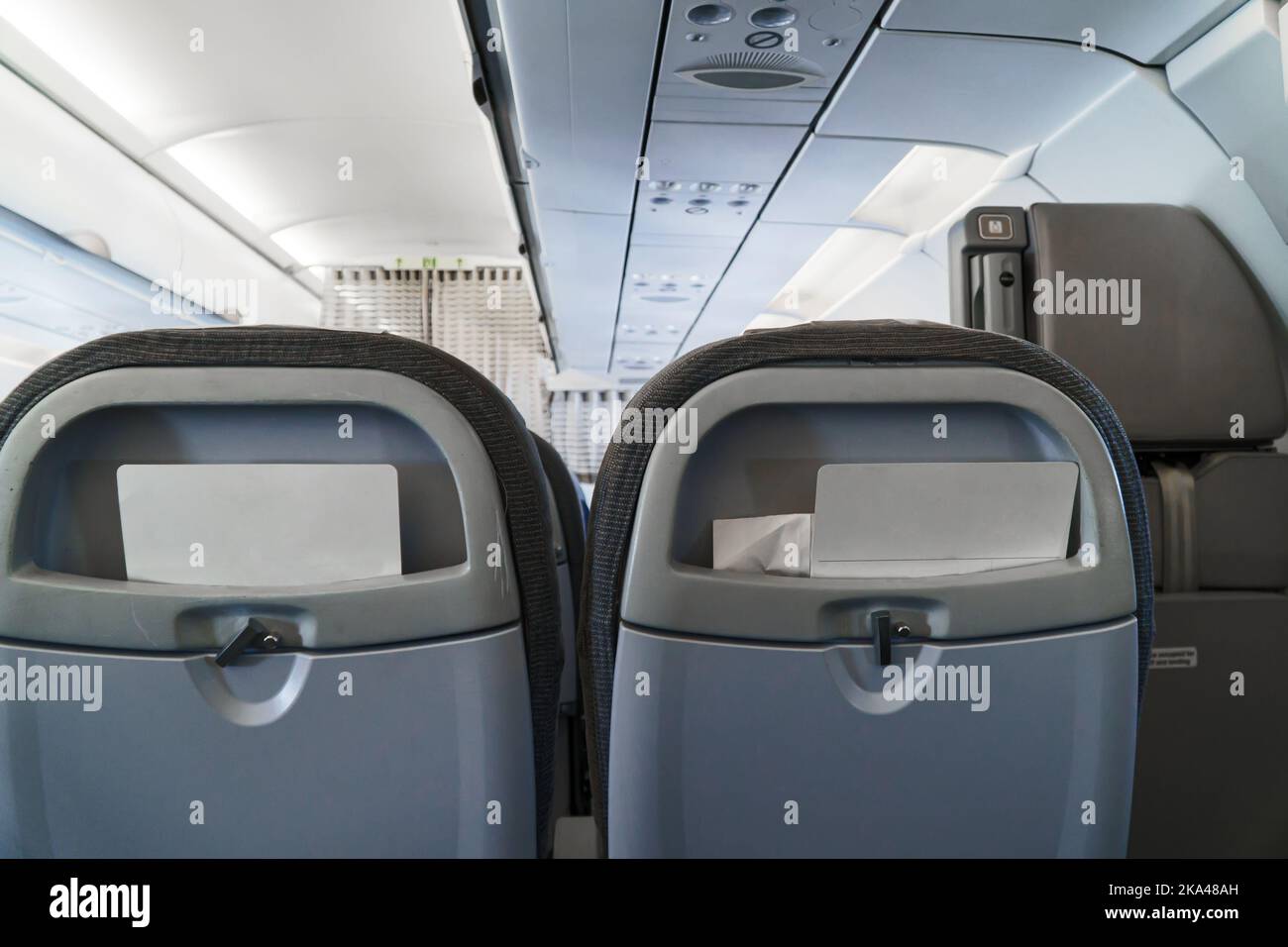 Inside the cabin of a passenger plane Stock Photo - Alamy