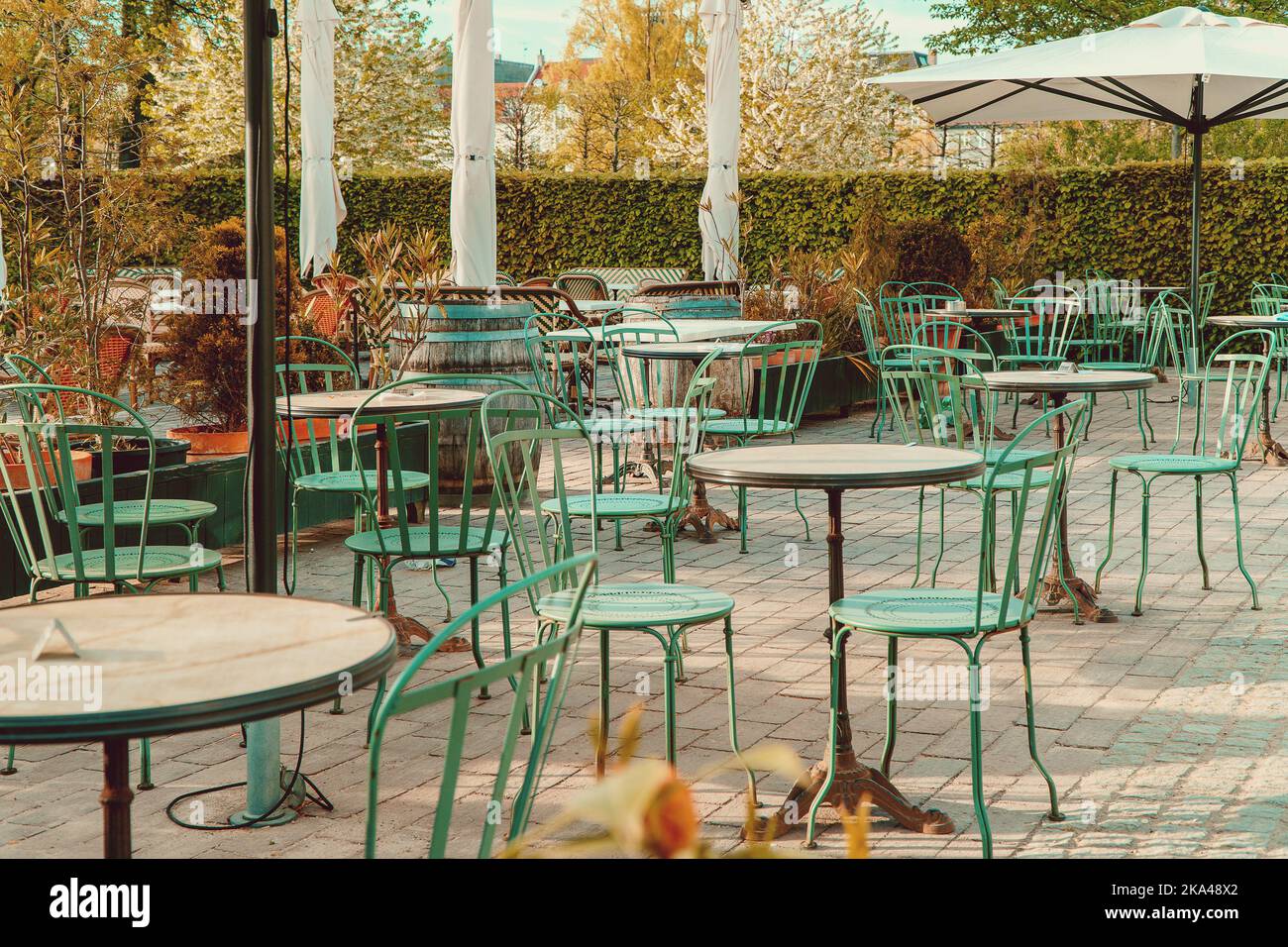 Outdoor cafe terrace exterior with chairs and tables Stock Photo - Alamy