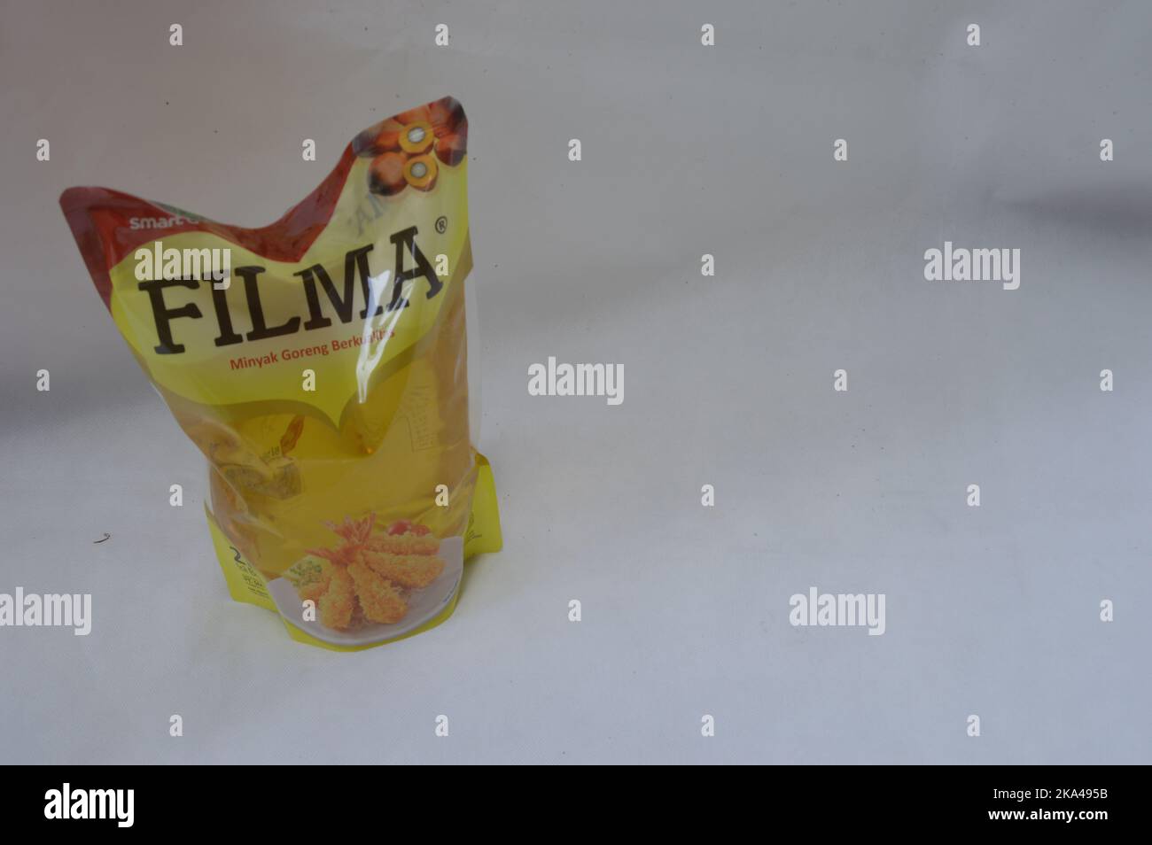 Filma packaged cooking oil on a white background Stock Photo - Alamy