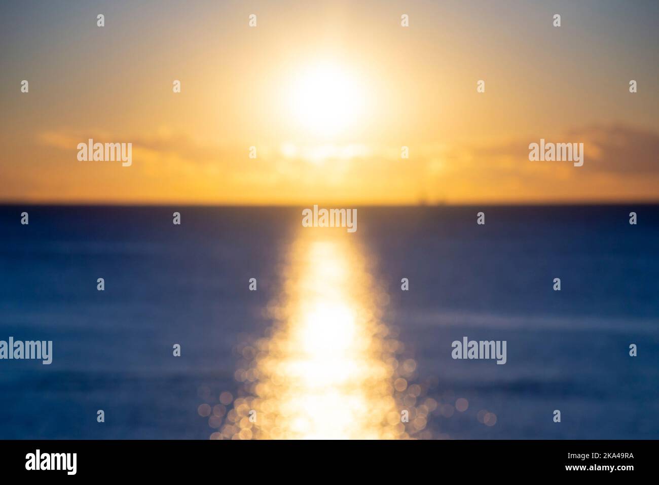 Blurred background. Sun shining in sky during sunset dawn. Sunrise ...