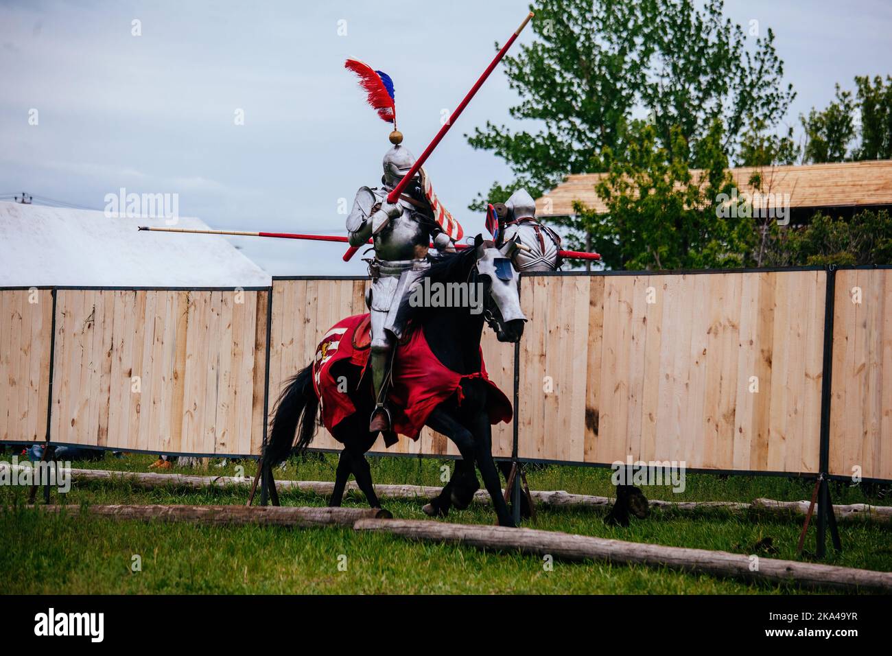Knights on horses in a jousting tournament Stock Photo - Alamy