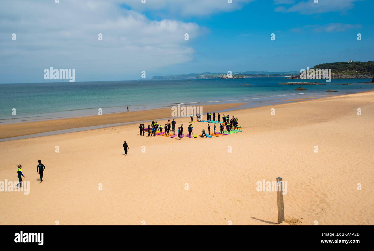 People giving a surf class on the Sardinero beach in the Cantabrian Sea ...