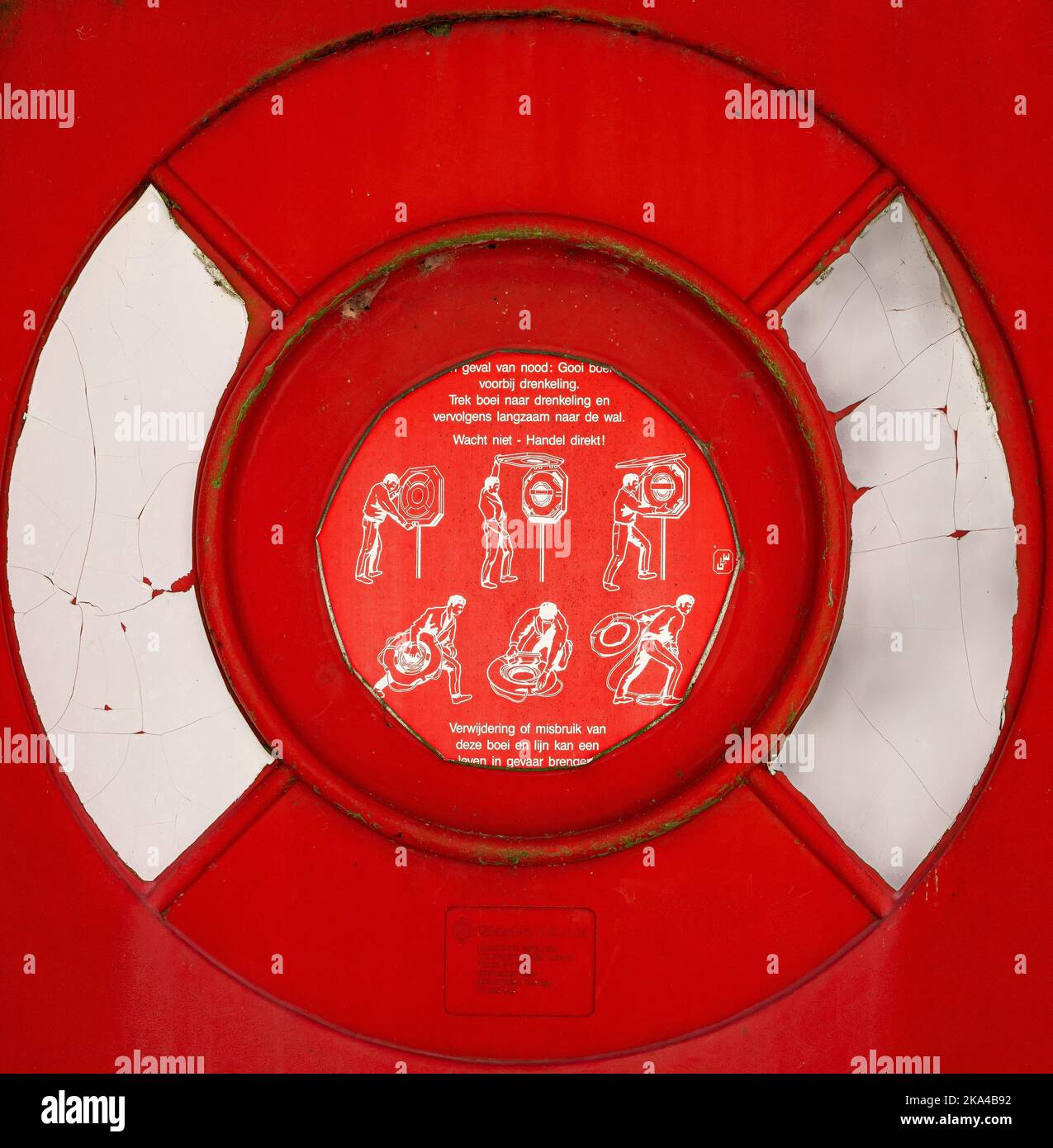 A red and white safety wing sign with the information and drawings of ...