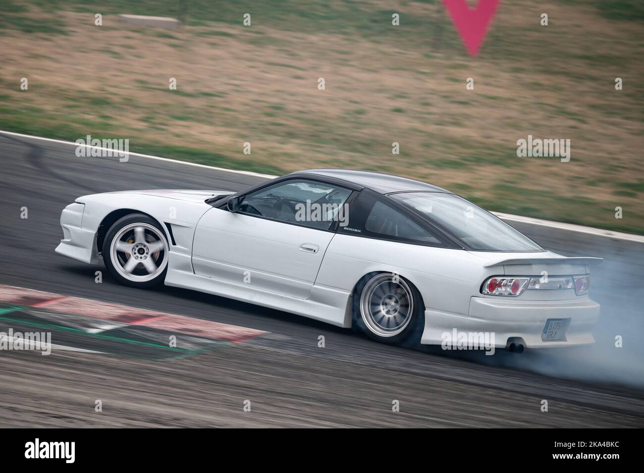 White Nissan Silvia S13 drifting on the racing circuit Stock Photo - Alamy