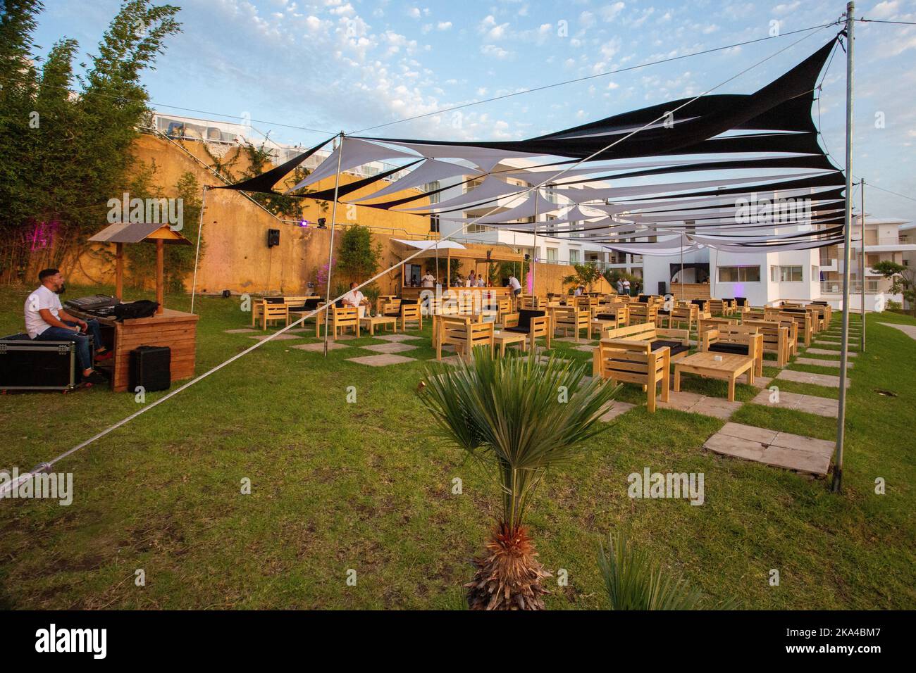 hotel patio terrace with wooden furniture Stock Photo - Alamy