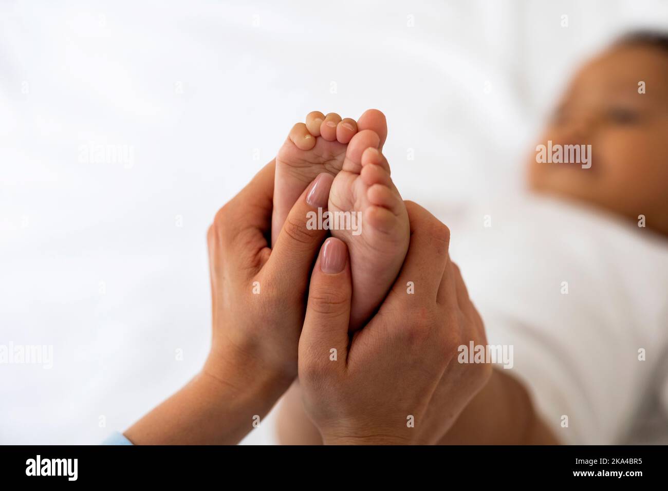 Baby foot reflexology points hi-res stock photography and images - Alamy