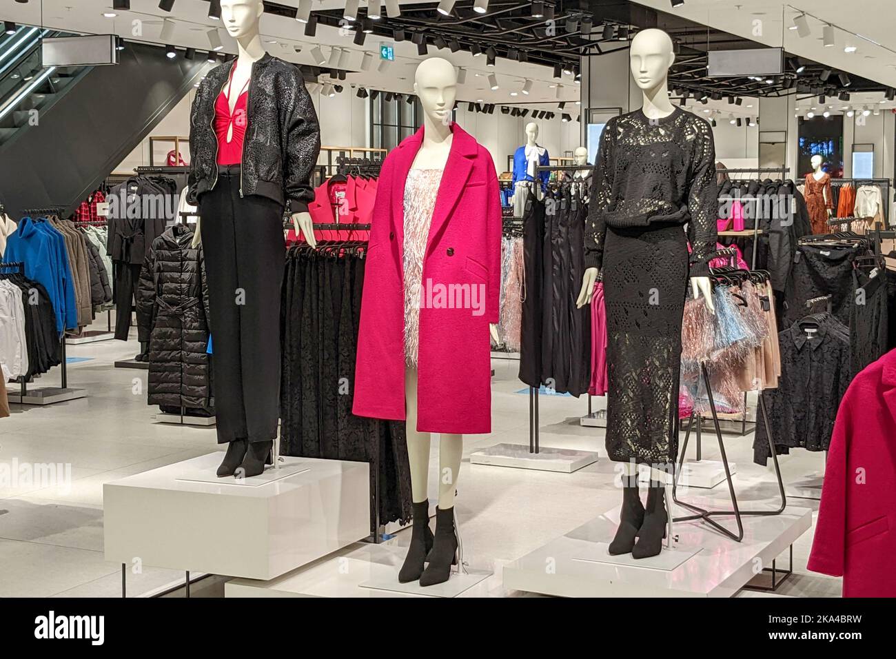 Modern fashionable brand interior of clothing store inside shopping ...