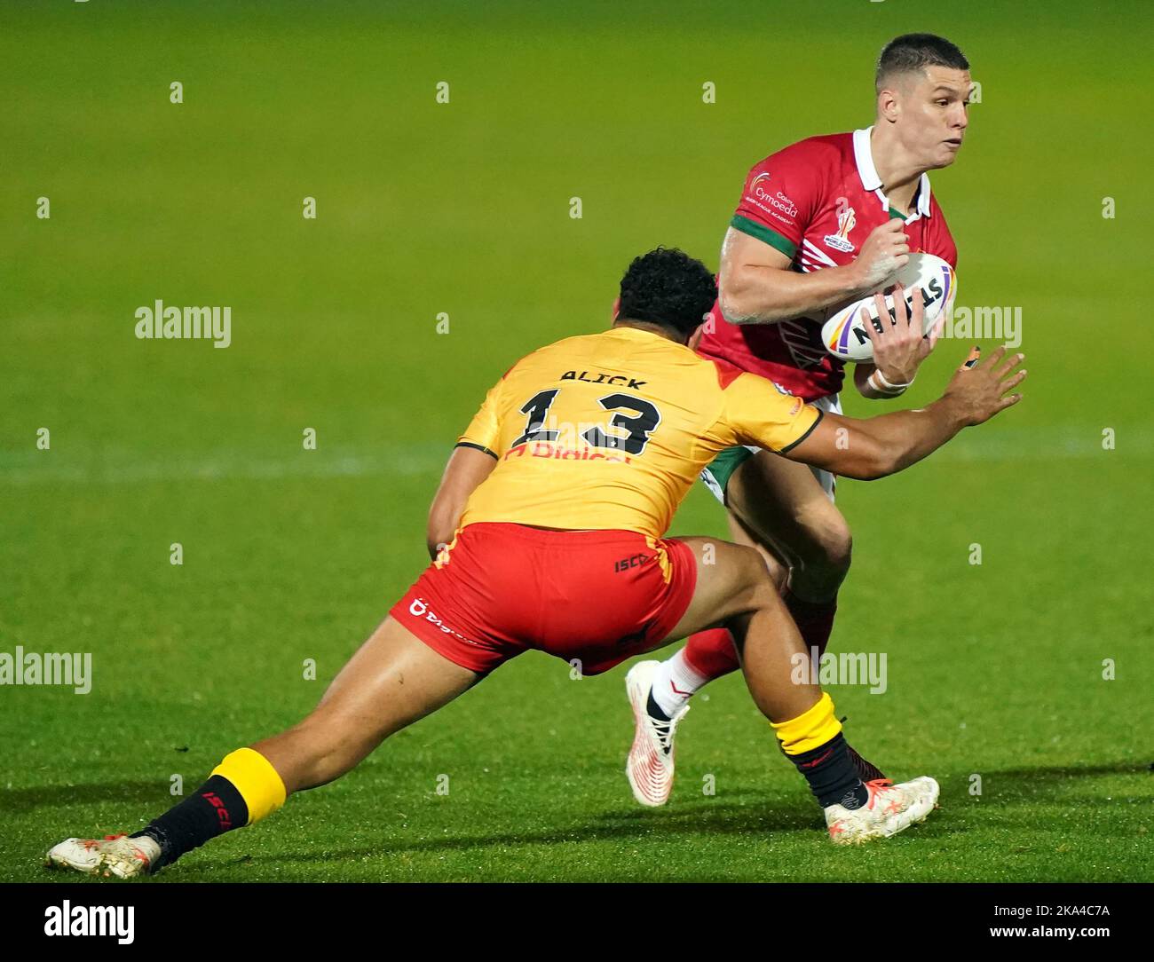 Wales' Josh Ralph (right) tries to get past Papua New Guinea's Jacob ...