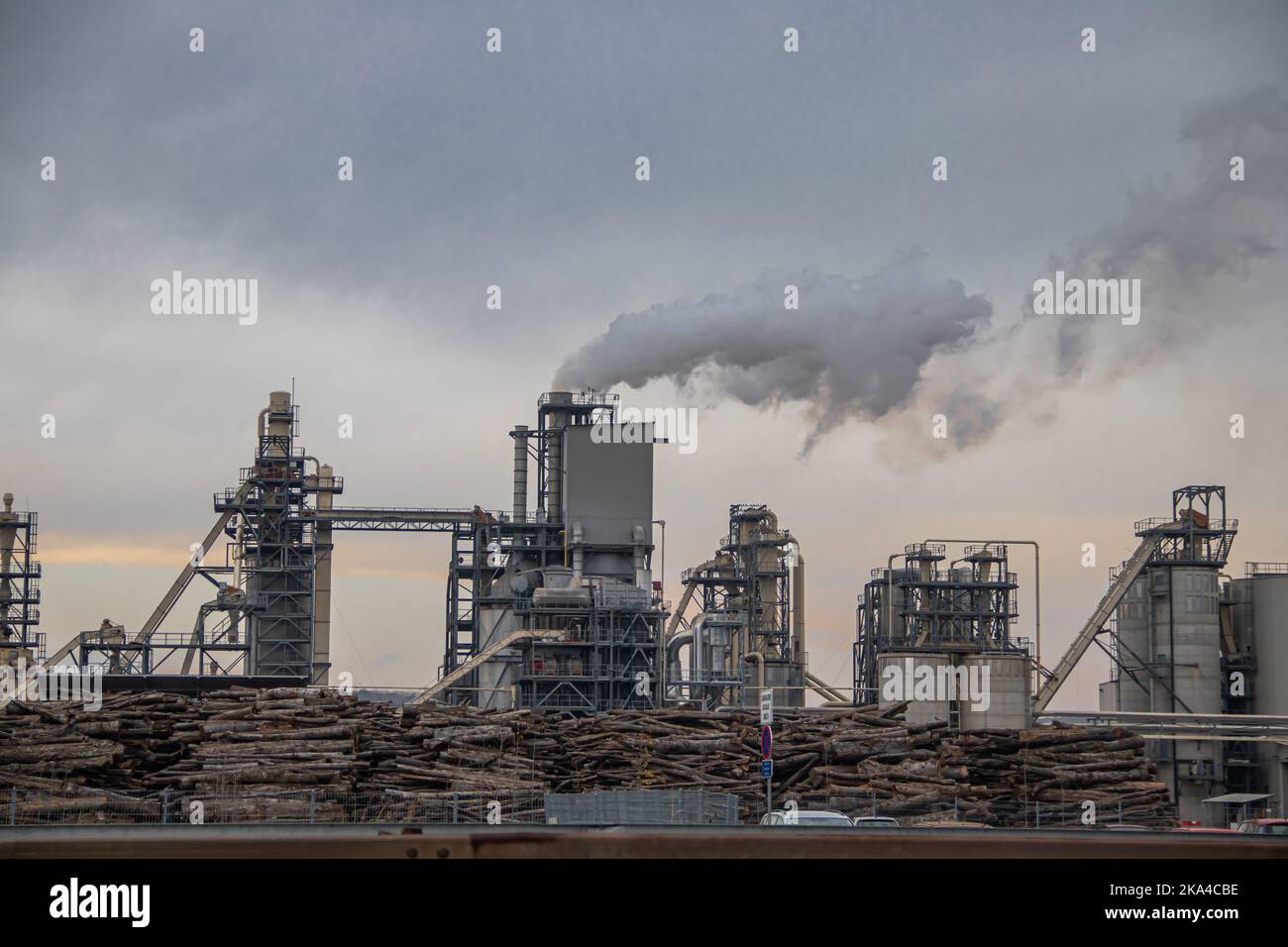 City pollution mixed with morning fog, industrial chimneys around ...