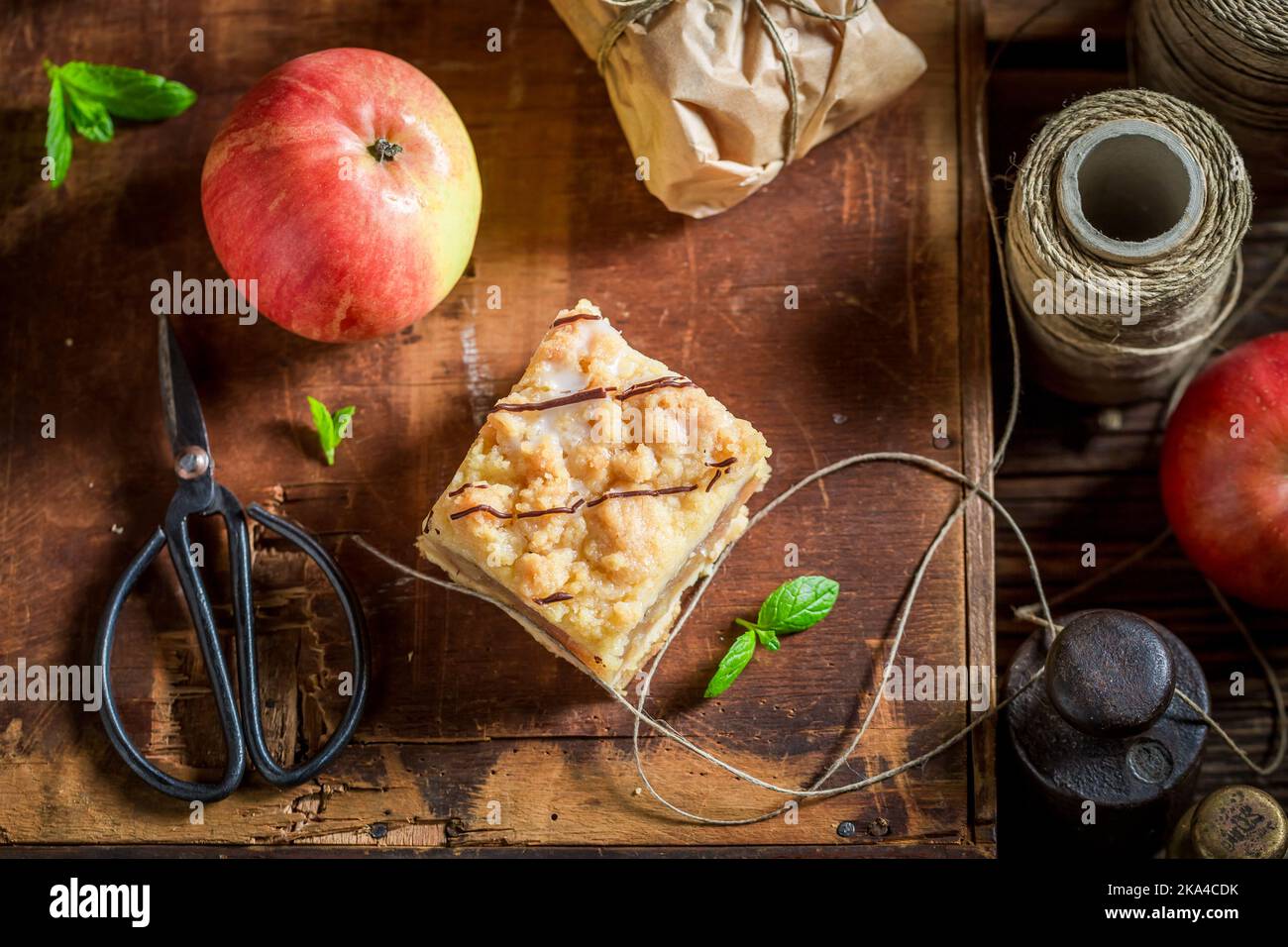 Rustic and tasty take away apple pie packed in a paper. Apple pie with ...