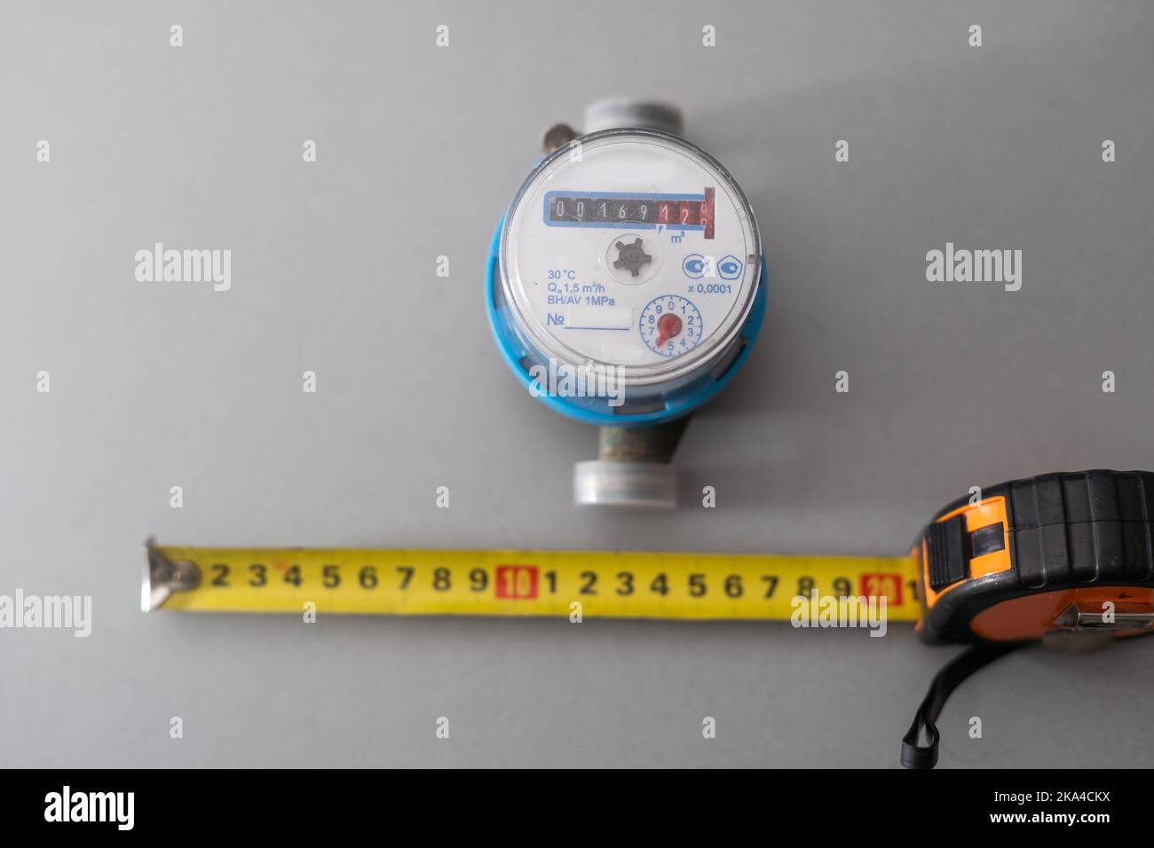 water meter and tape measure Stock Photo - Alamy
