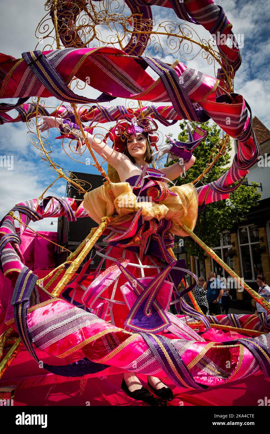 The people in colorful dresses performing at Fair Fun and Dancing in ...