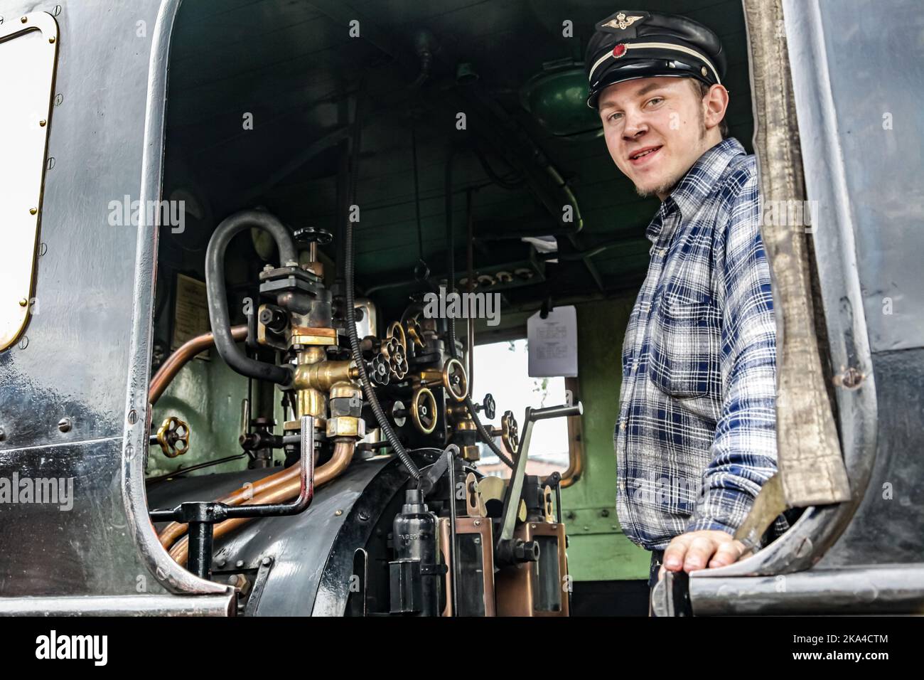 Locomotive driver on steam locomotive Aurskog Holandsbanen Sorum Norway ...