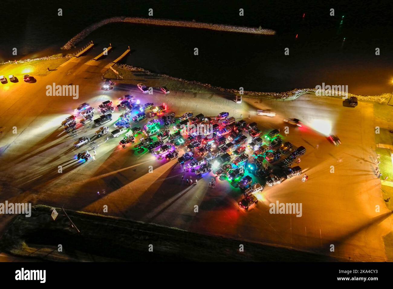 A gathering of jeeps with night lights Stock Photo - Alamy