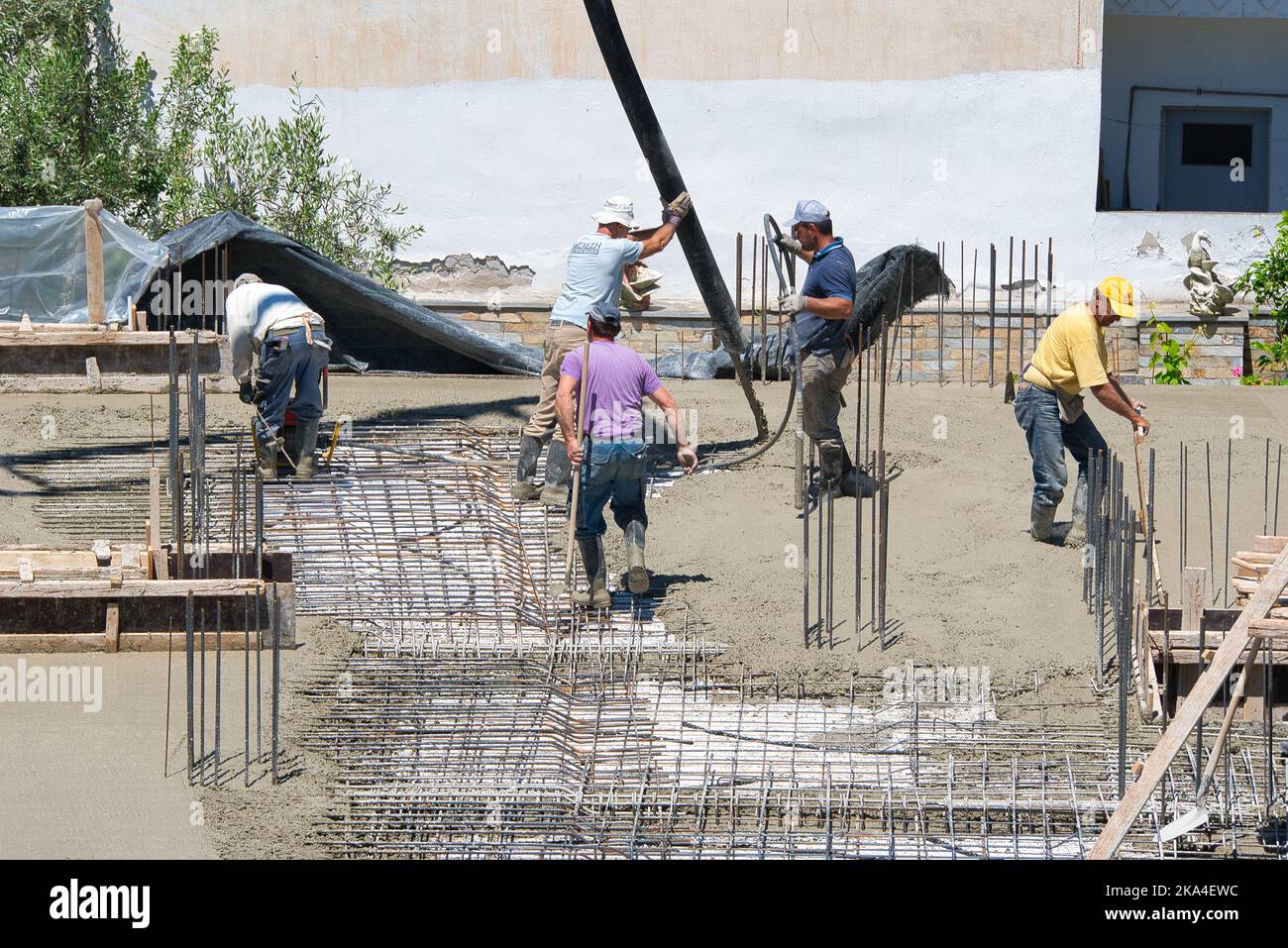 construction workers while working in a building under construction ...