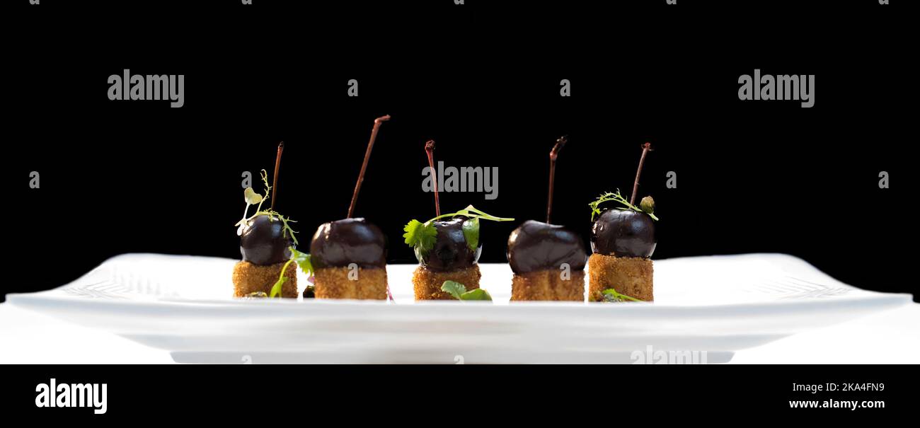 Pan fried dessert with fresh cherry on top Stock Photo - Alamy