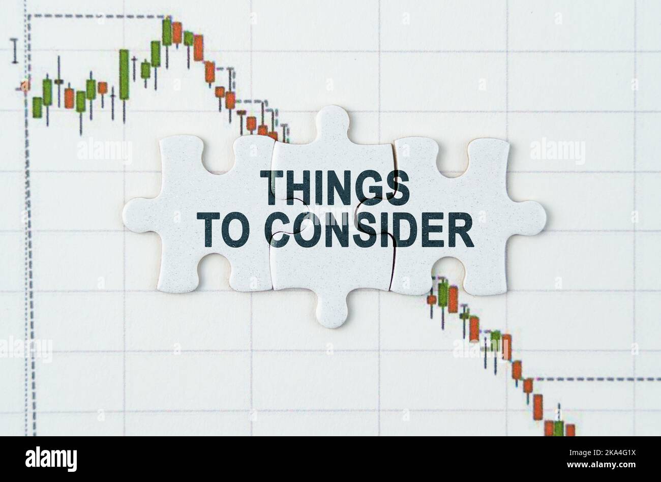 Business concept. On the quotes chart there are puzzles with the ...