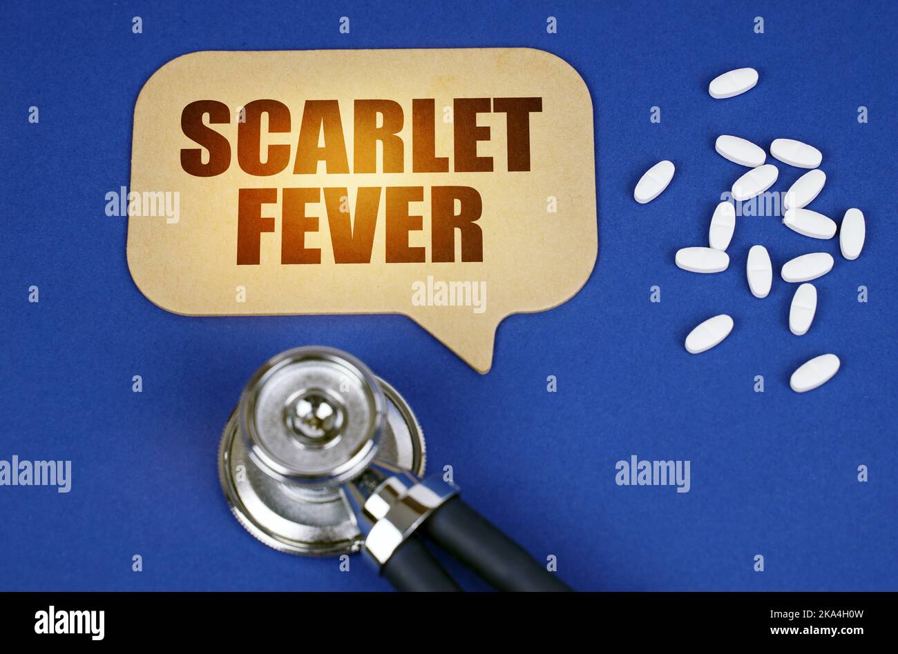 Medical concept. On the blue surface of the tablet, a stethoscope and a ...