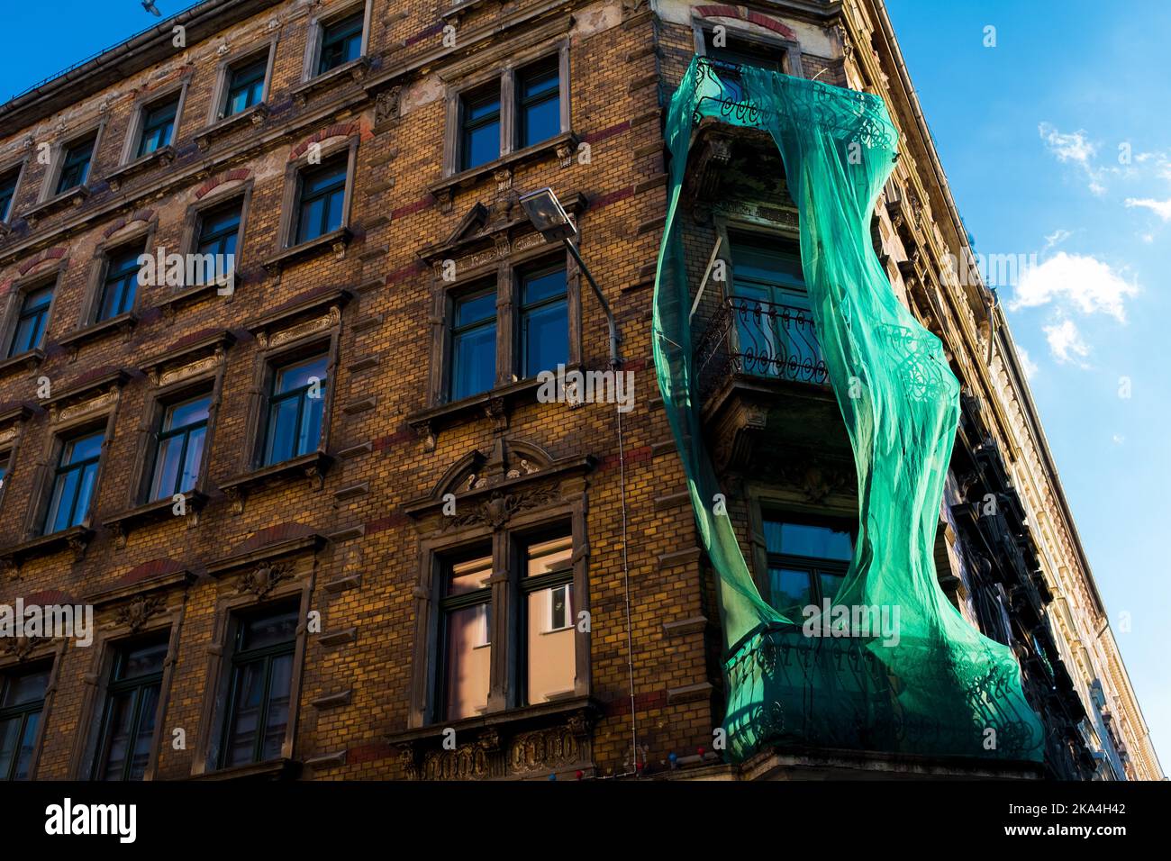 A low angle shot of an apartment building with balconies under ...