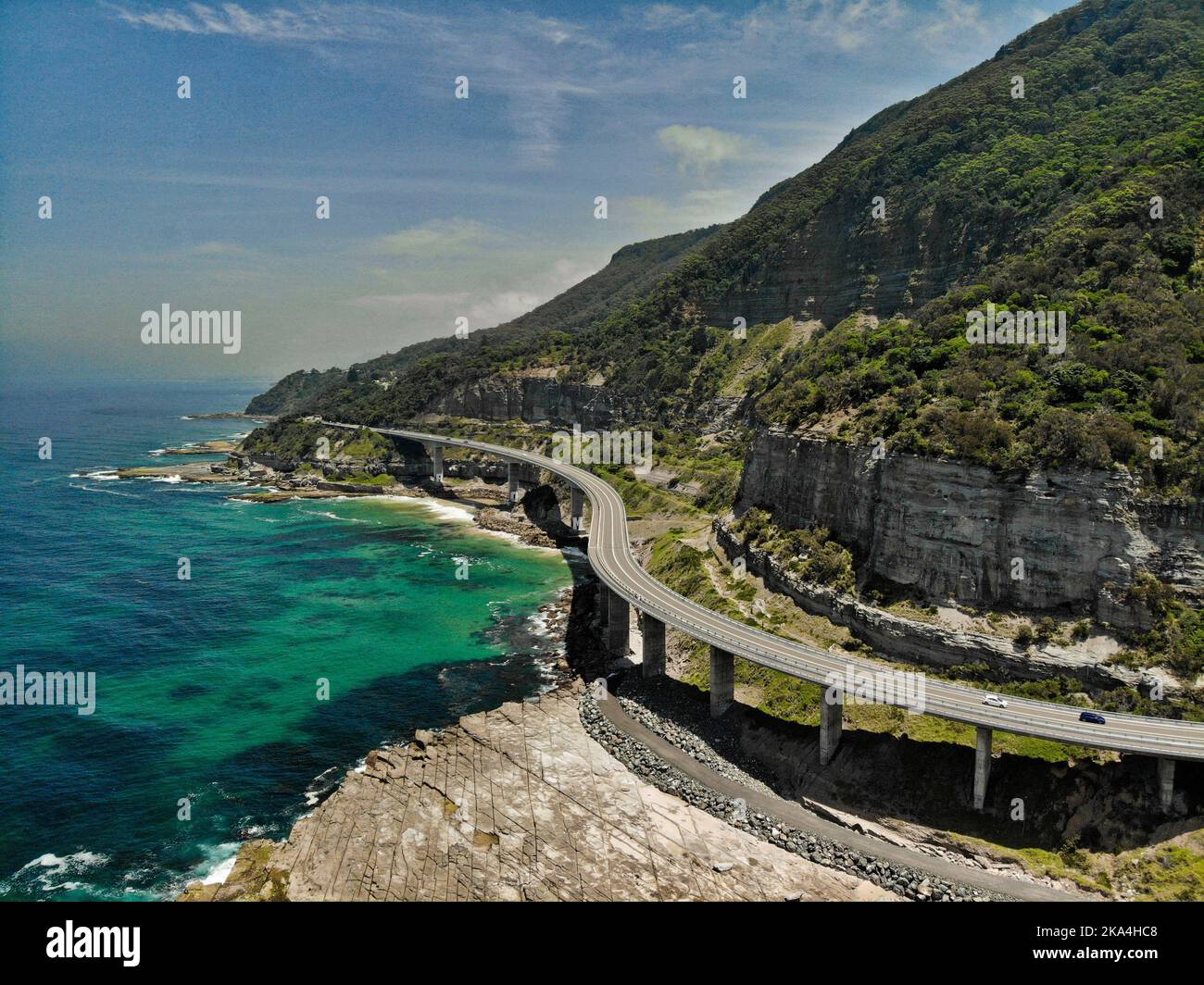 An aerial view of the famous Sea Cliff Bridge on the coast of Lawrence ...