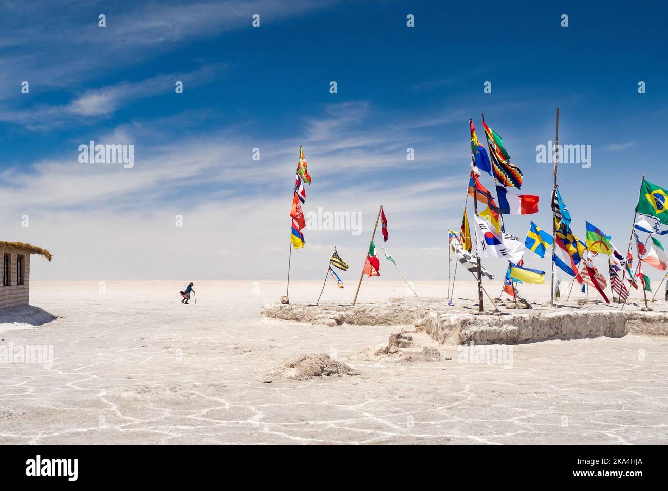 The colorful flags from all over the world at Uyuni salt flats in ...