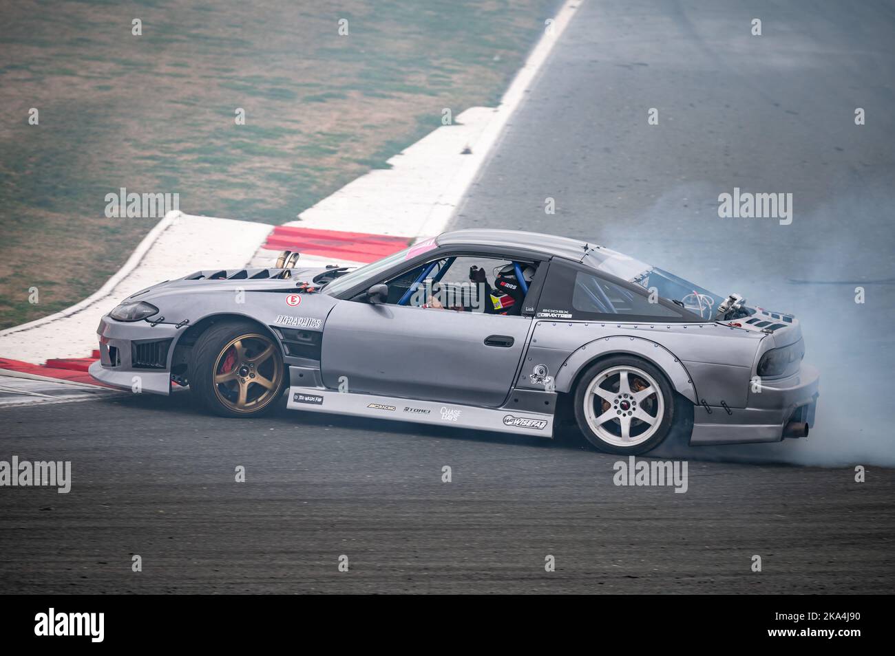 Nissan Silvia S13 5 drifting on the racing circuit, S13 S15 Stock Photo - Alamy