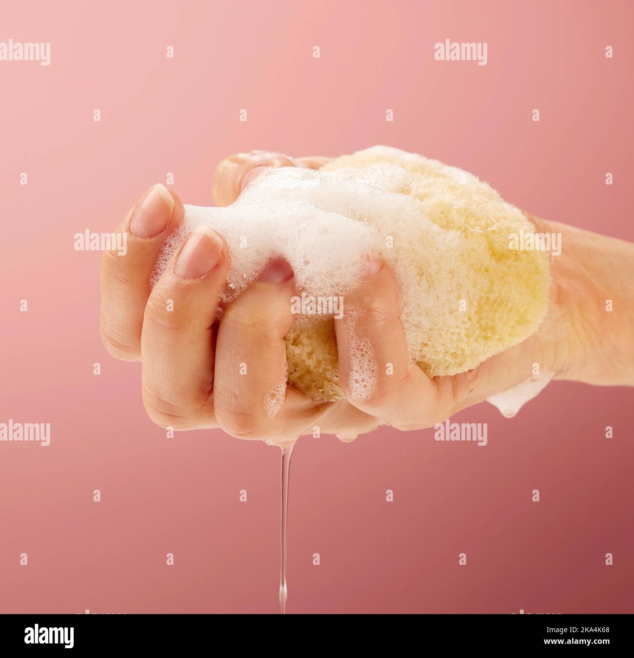 Squeezing sponge hi-res stock photography and images - Alamy