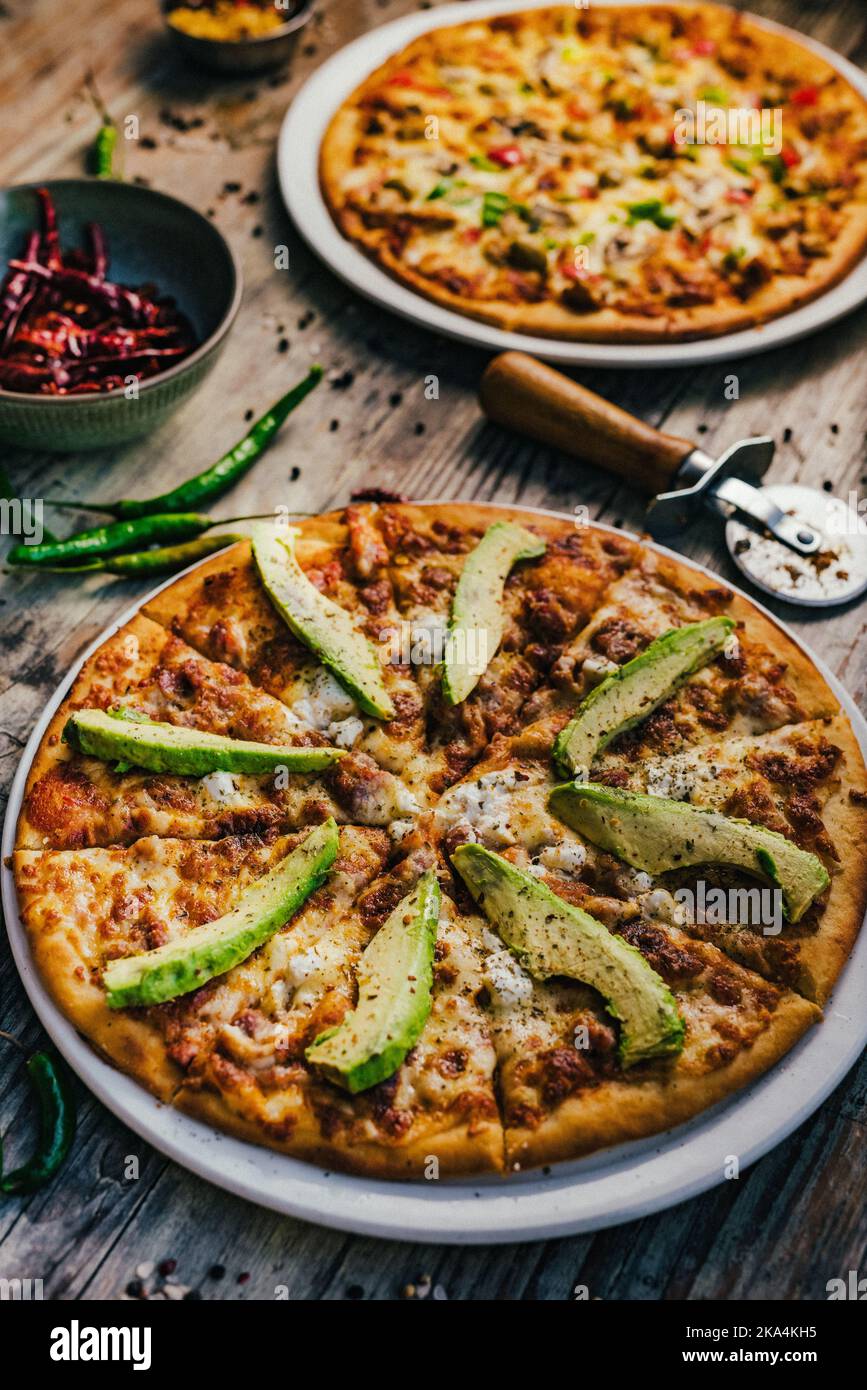 Pizza photography at restaurant with props Stock Photo - Alamy