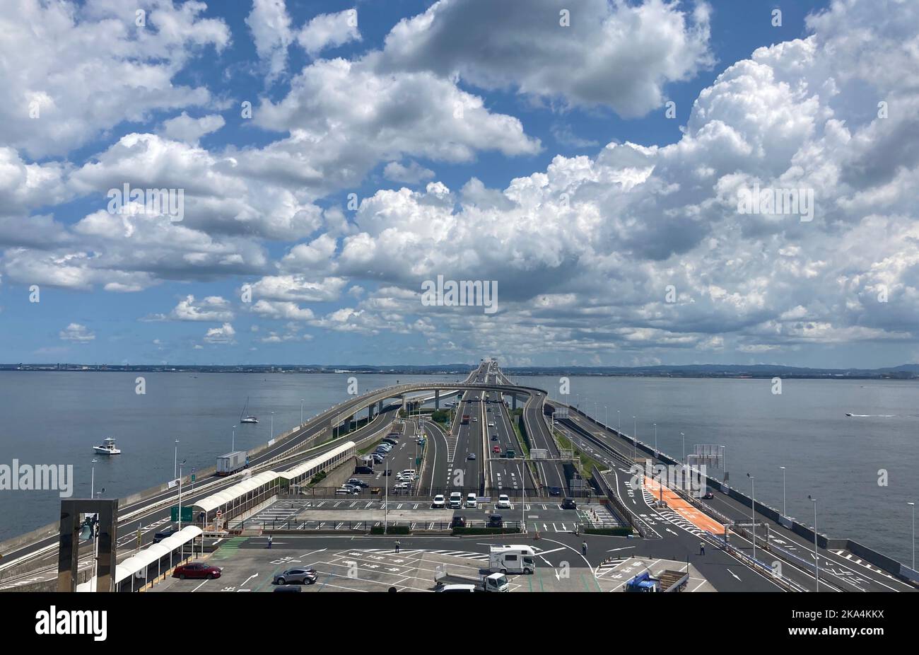 The Tokyo Bay Aqua-Line bridge against a blue cloudy sky in Japan Stock ...