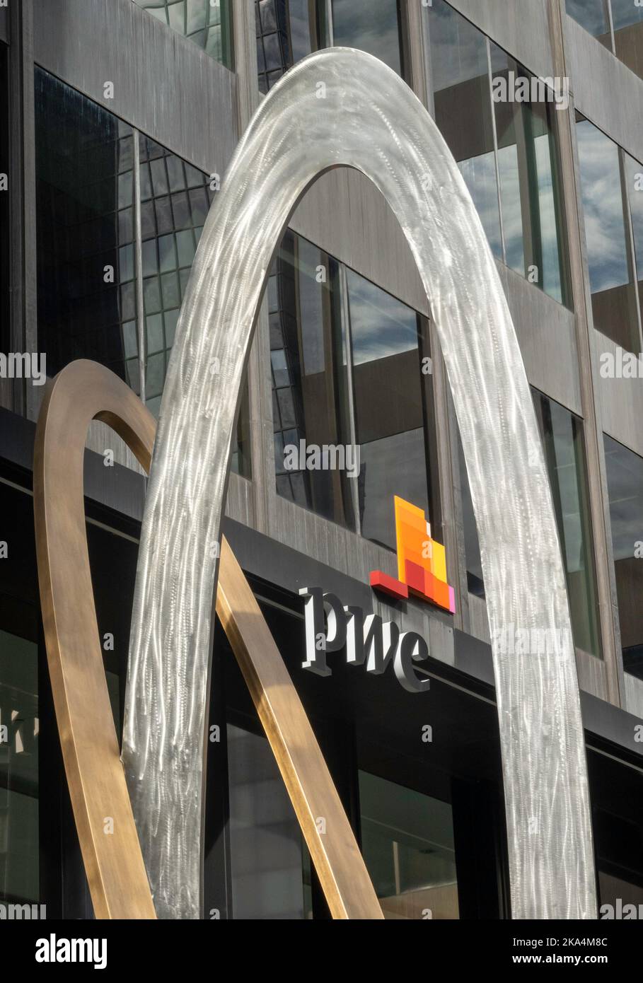 "The couple" sculpture by Arthur Carter in front of 90 Park Ave. frames ...