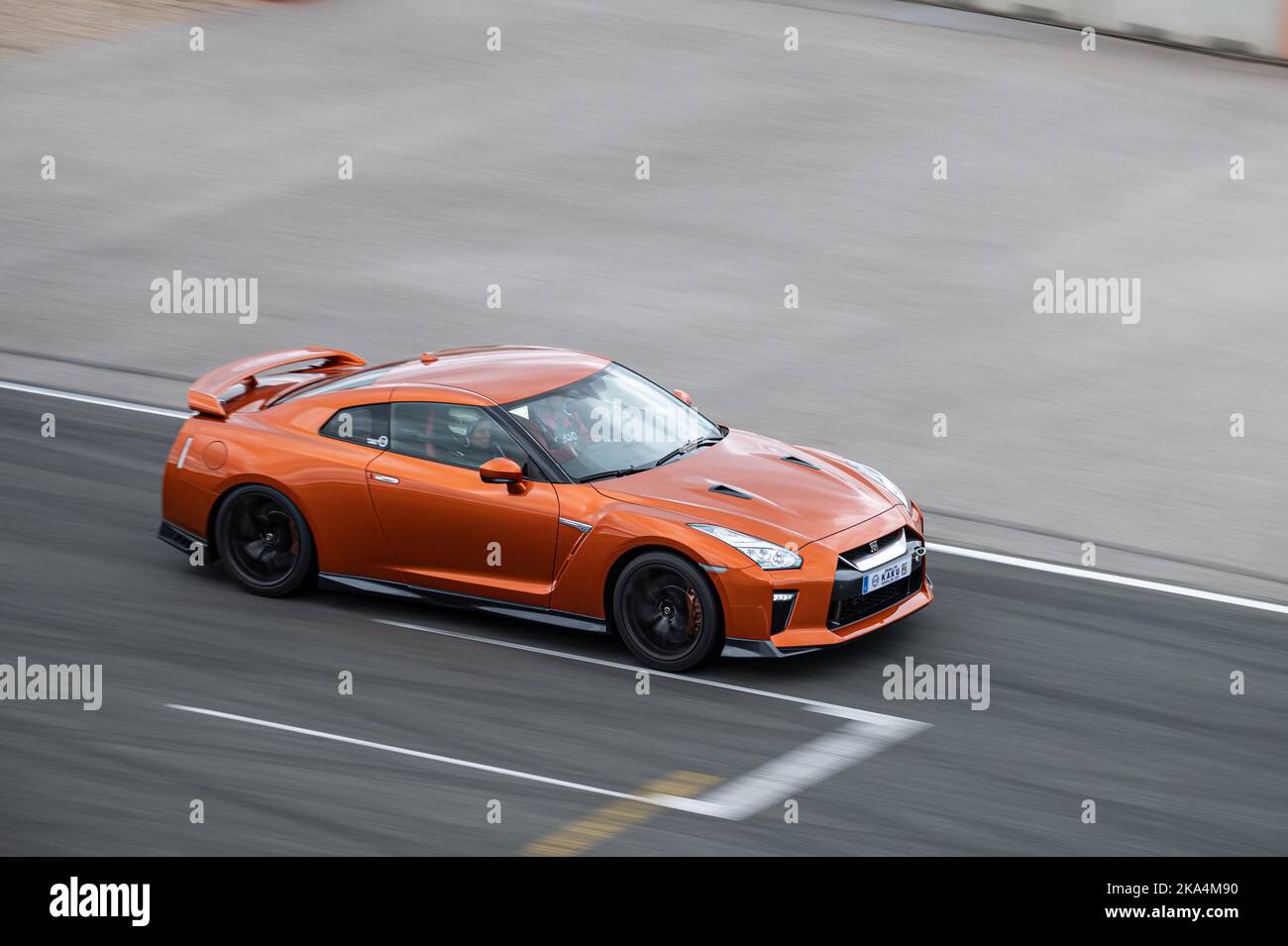 Nissan Skyline GT-R R35 racing on the race track Stock Photo - Alamy