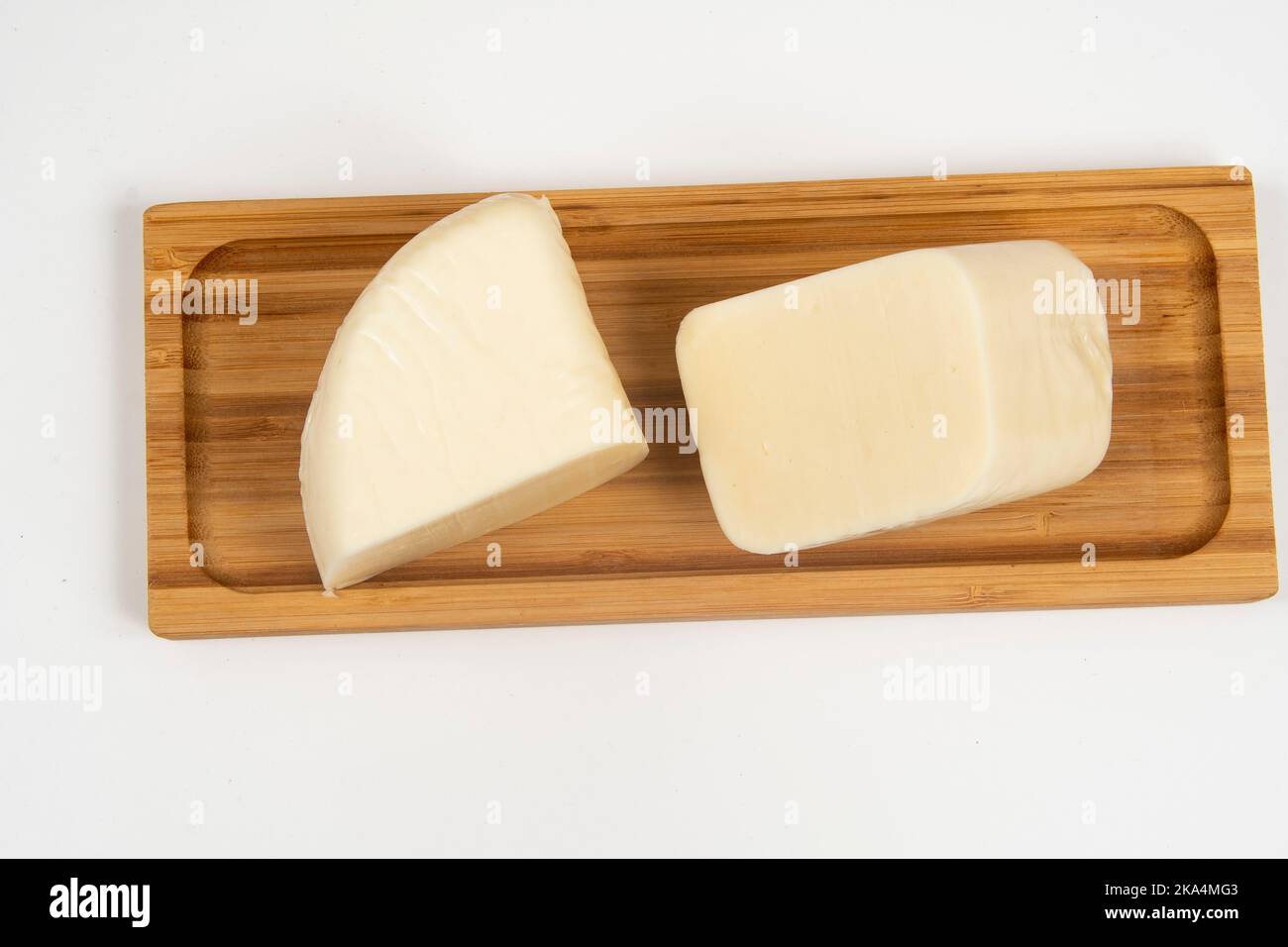 Minas half-cured cheese on a bamboo tray Stock Photo - Alamy