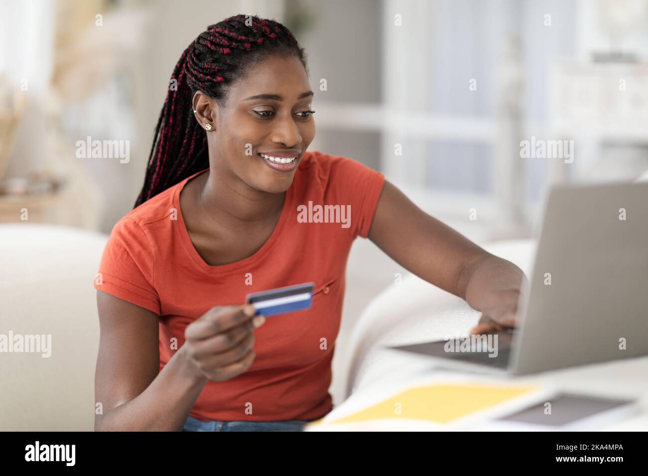 Online Payments. Smiling Black Female Using Laptop And Credit Card At ...