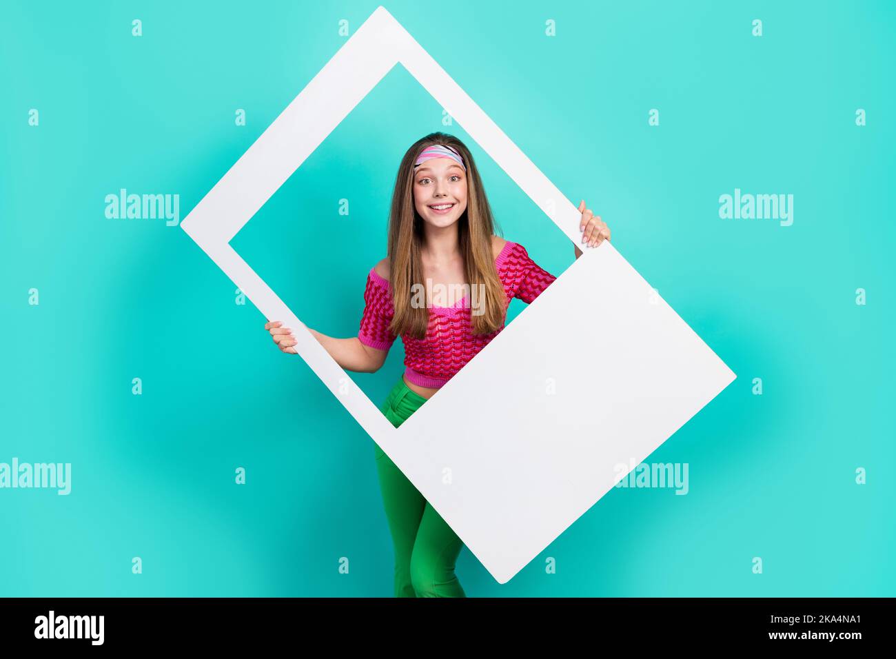 Photo of adorable shiny school girl dressed pink crop top rising white ...