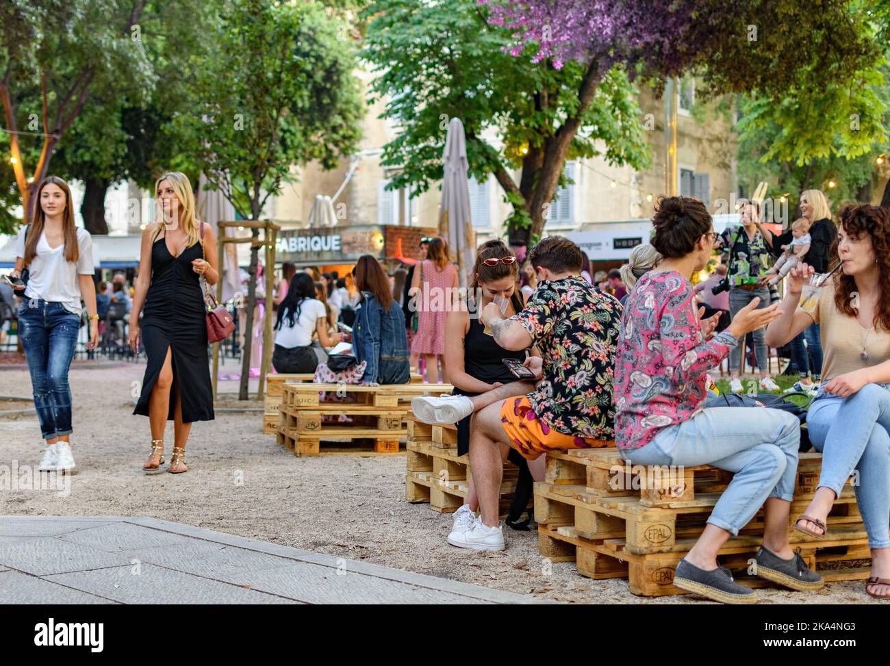 A crowd of people at a food festival in park Stock Photo - Alamy